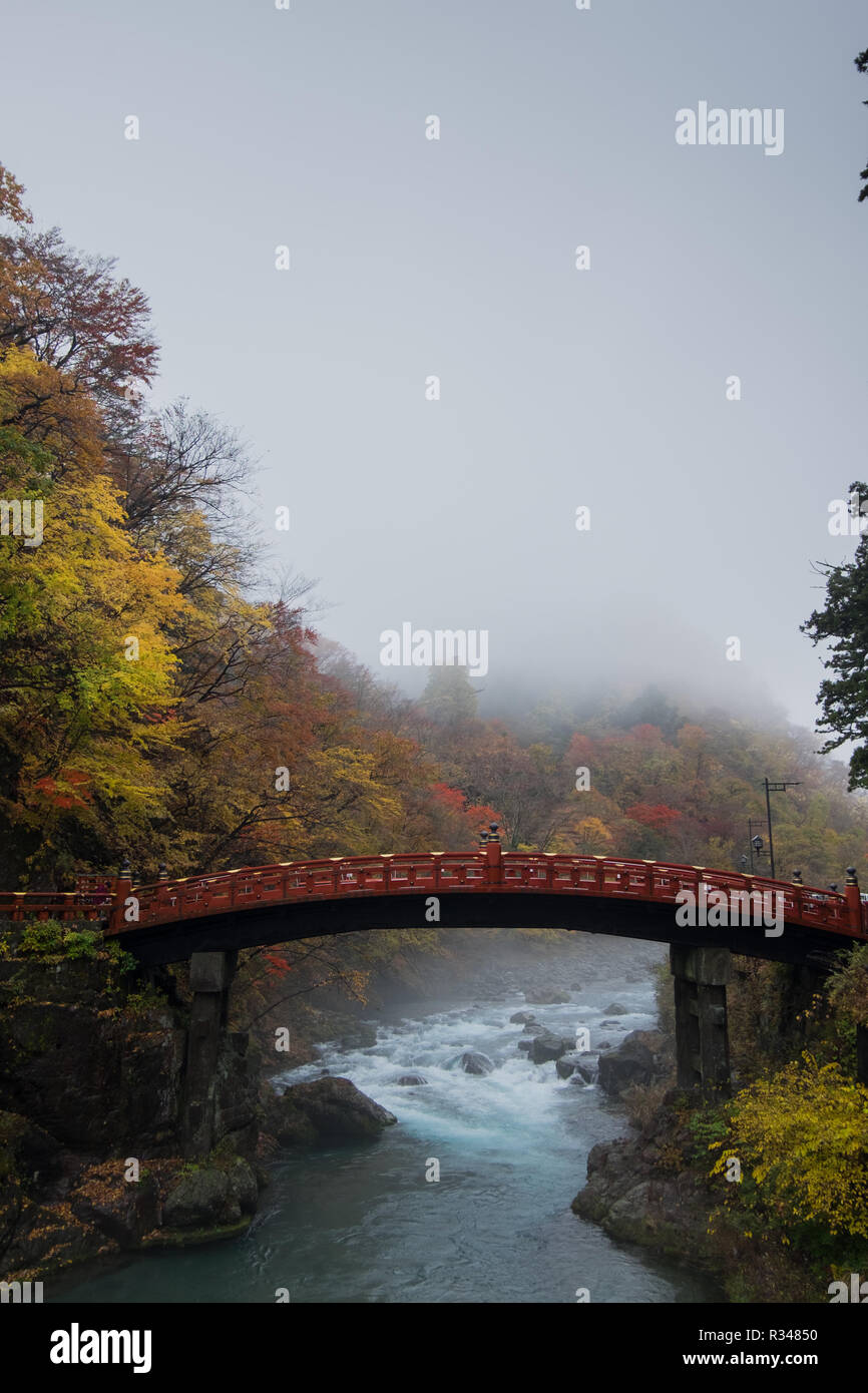 Looking at the beautiful Shinkyo bridge in Nikko, Japan on a misty ...