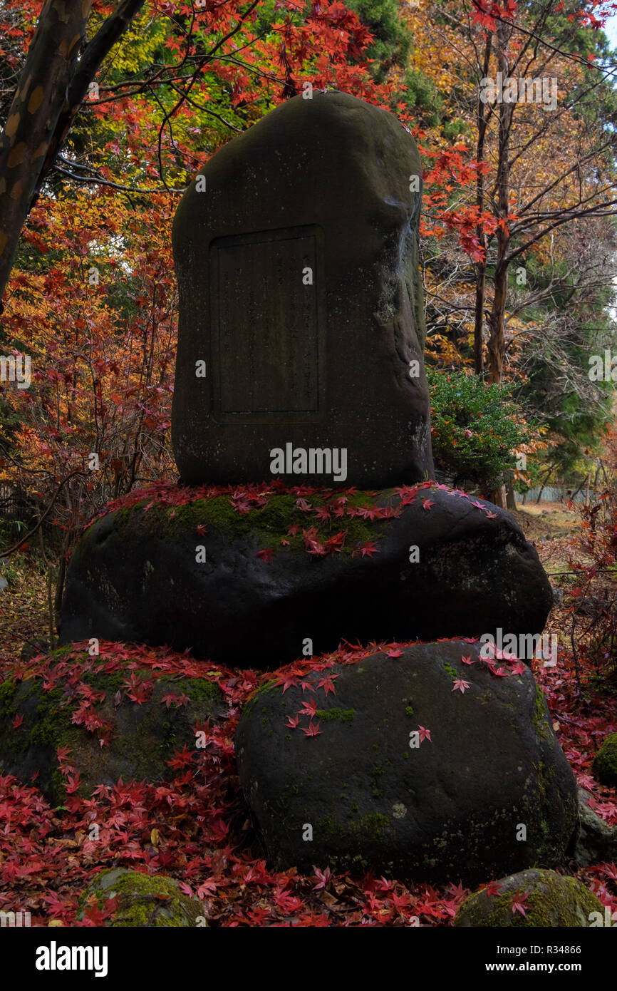 An old stone Japanese monument in Nikko, Japan Stock Photo - Alamy
