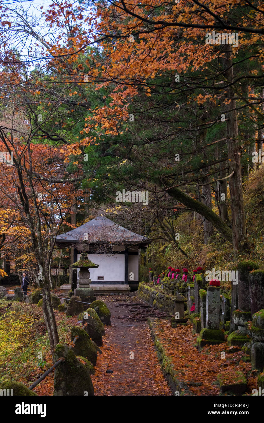 A Buddhist temple along the Daiya river in Nikko, Japan during peak ...