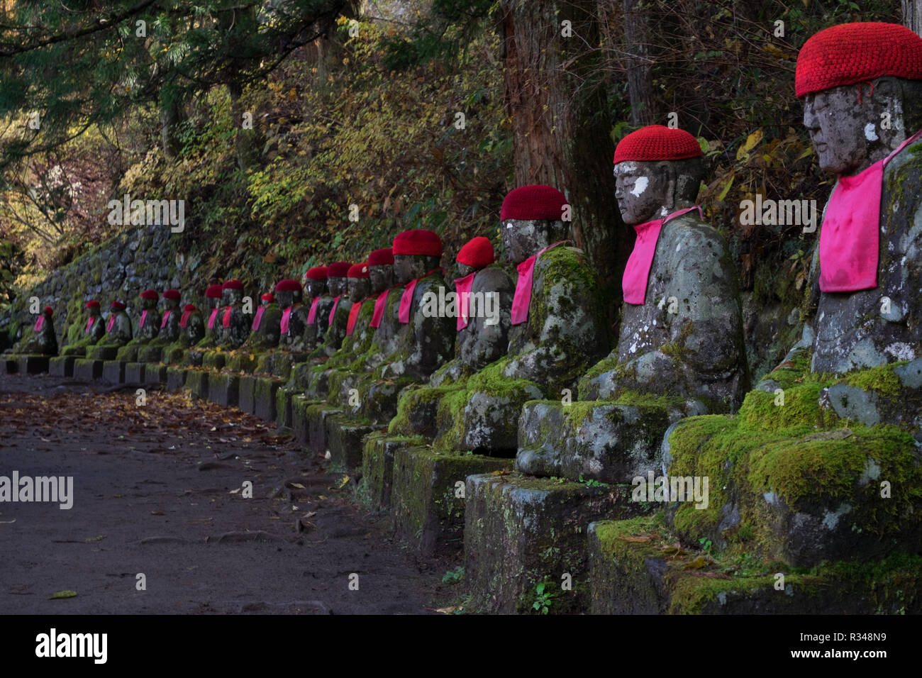Sacred jizo statues line a path hi-res stock photography and images - Alamy