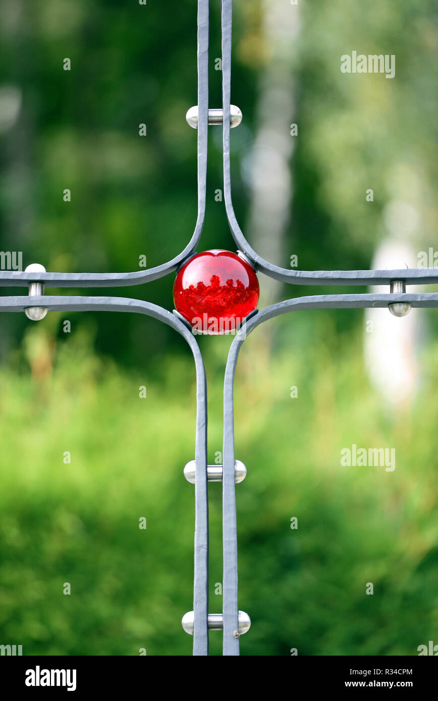cross with red glass bead Stock Photo - Alamy