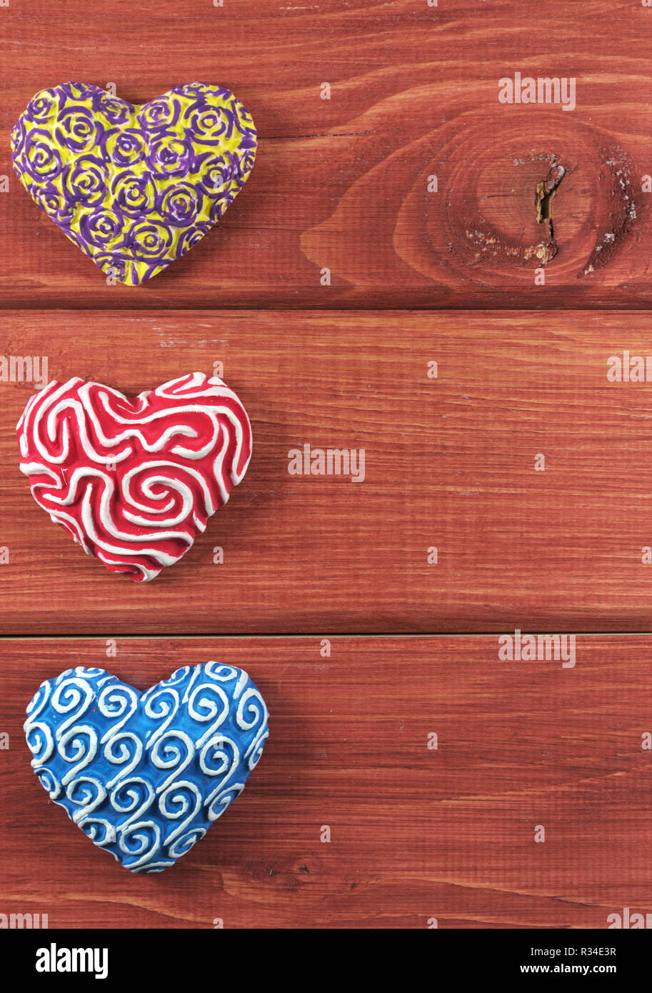 three hearts in a row Stock Photo - Alamy