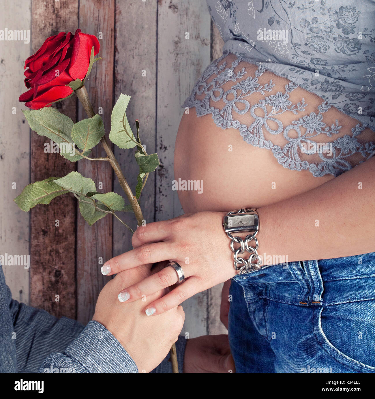 red rose and baby belly Stock Photo - Alamy