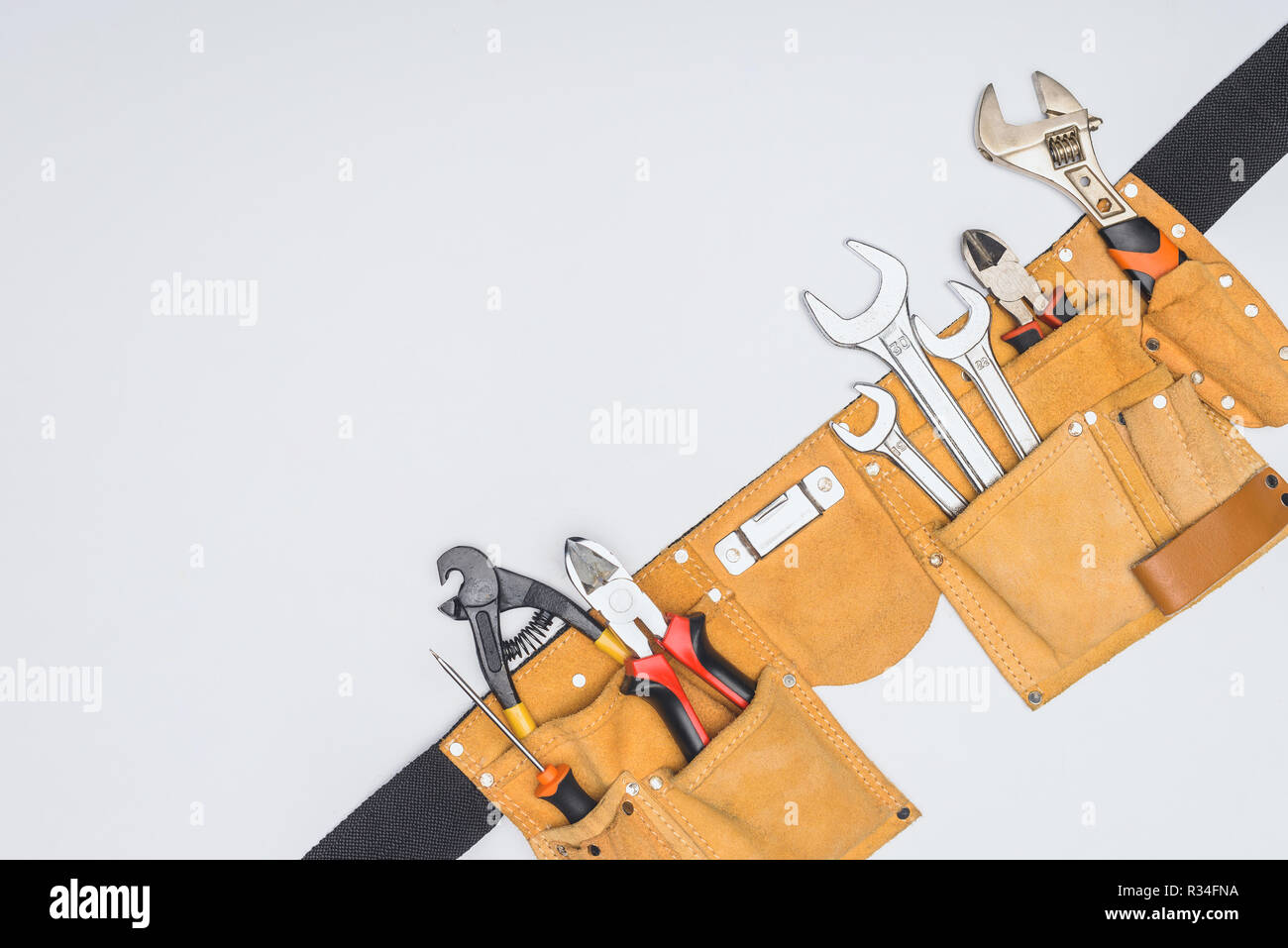 Fixing his belt hi-res stock photography and images - Alamy