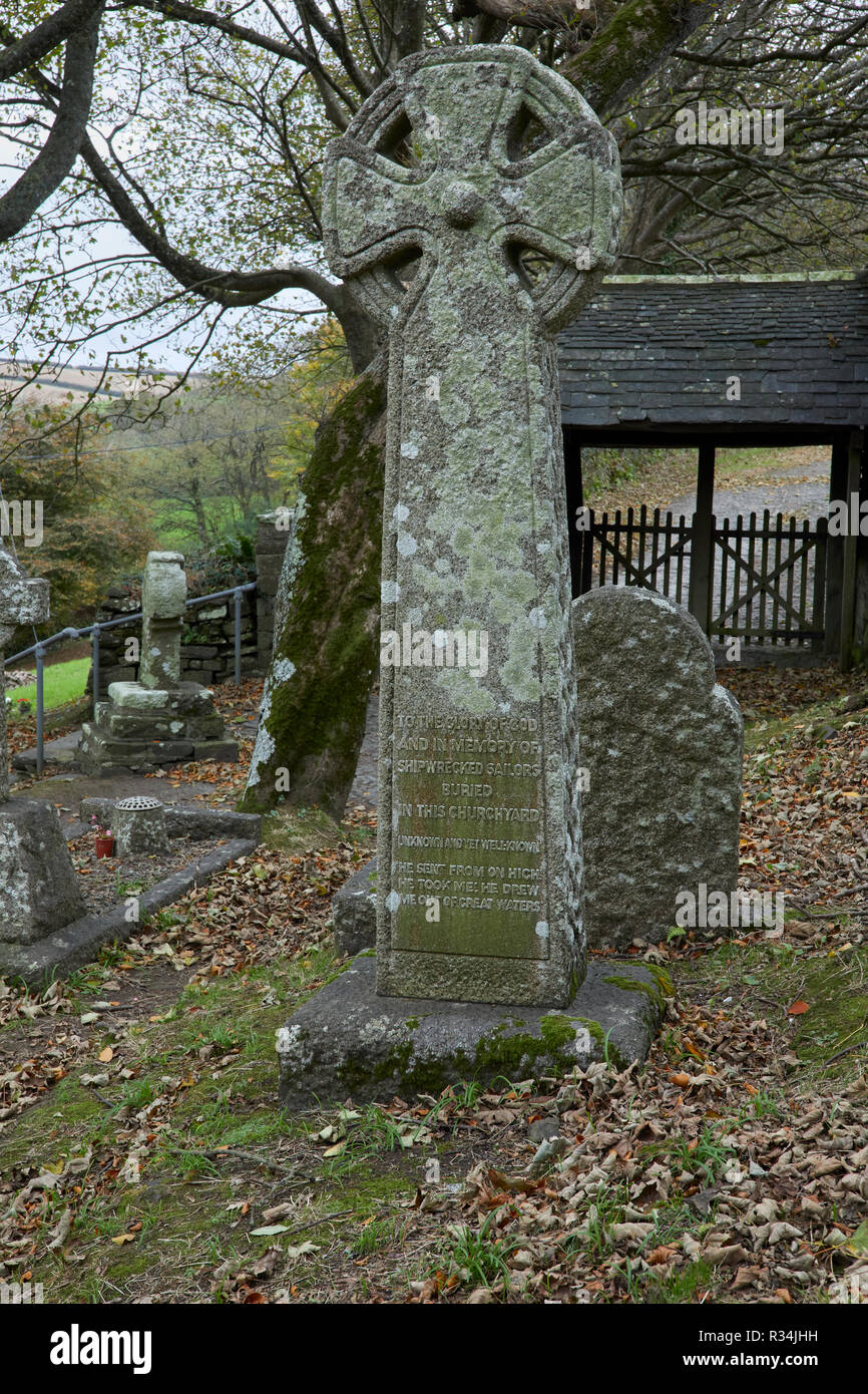 Stone celtic cross in the churchard of St Morwenna, Morwenstow. In ...