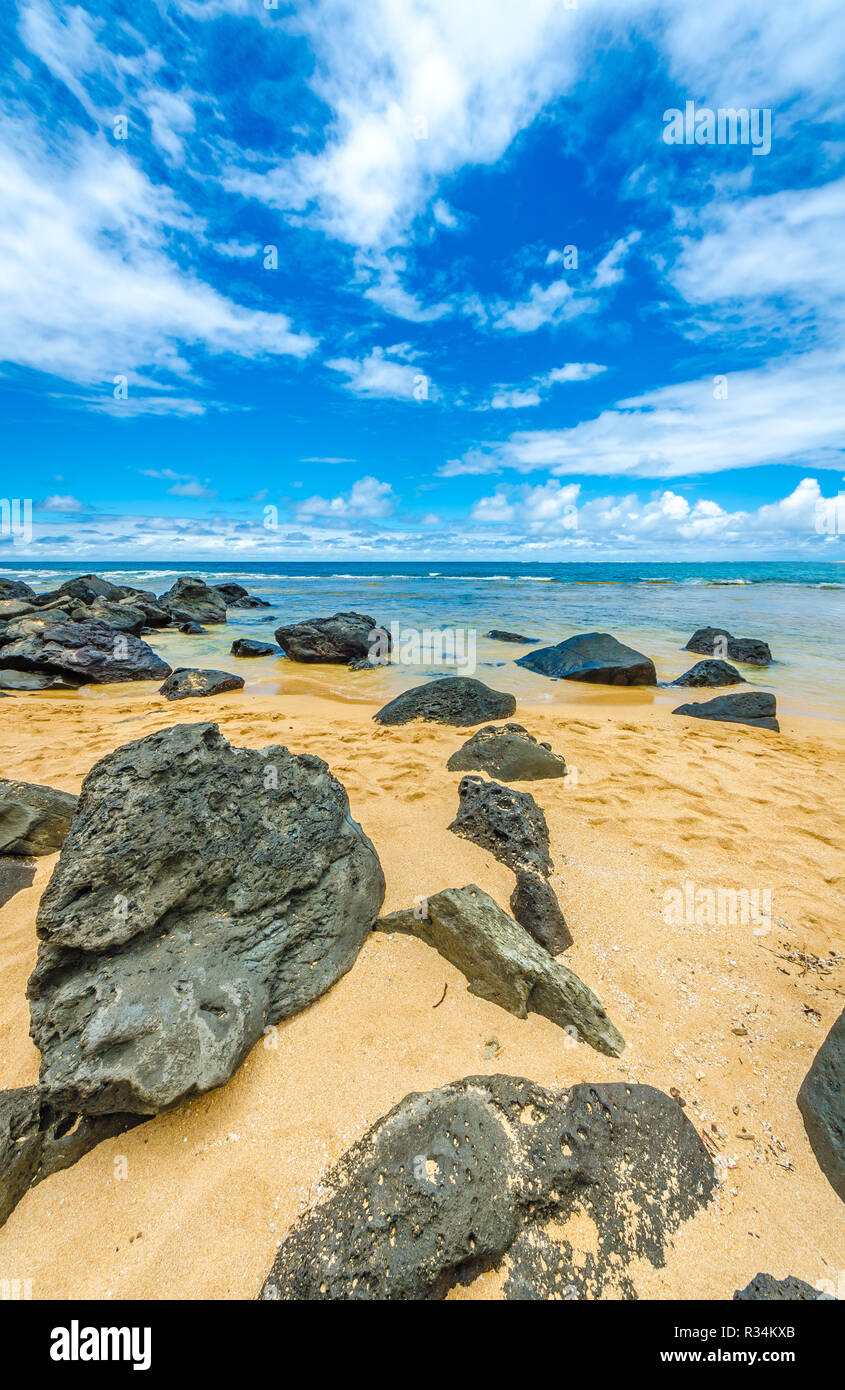 Rocks along the beach in Kauai, Hawaii Stock Photo - Alamy