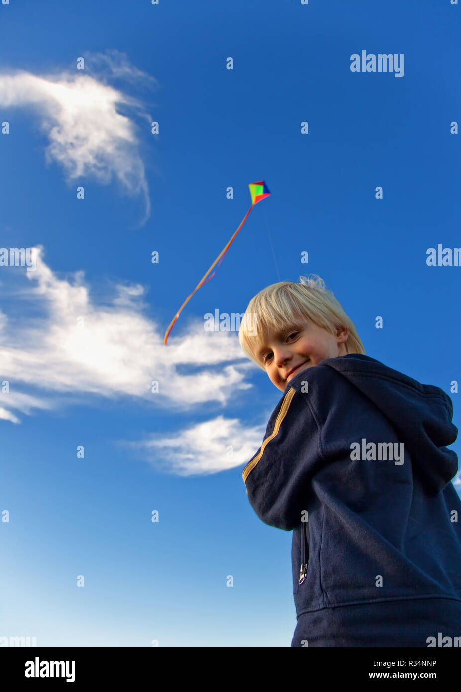 boy with kite in the wind Stock Photo - Alamy