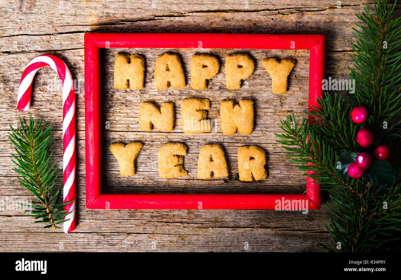 Happy new year note written with cookie letters Stock Photo - Alamy