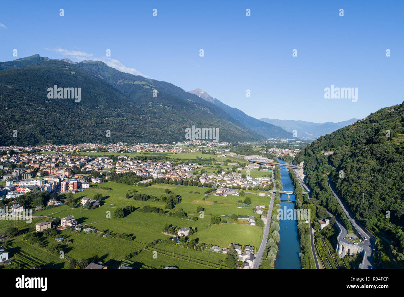 Adda river and city of Morbegno. Valtellina. Aerial shot Stock Photo ...