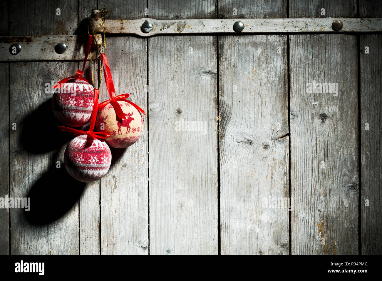 christmas balls on wooden wall Stock Photo - Alamy