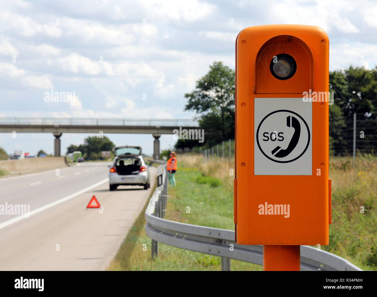 vehicle breakdown and emergency telephone on the highway Stock Photo ...