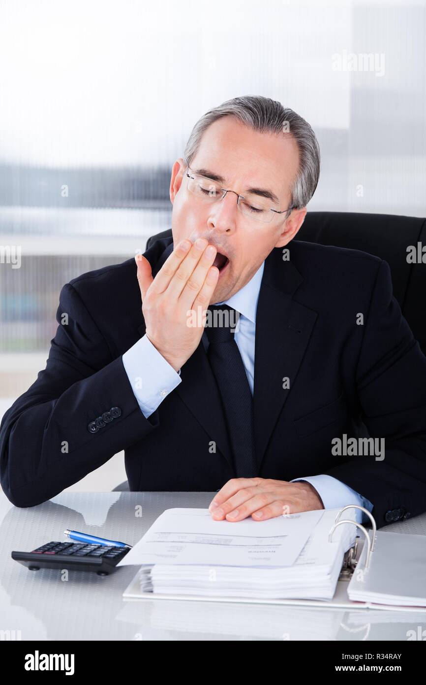 Office workers sleeping at desk hi-res stock photography and images - Alamy