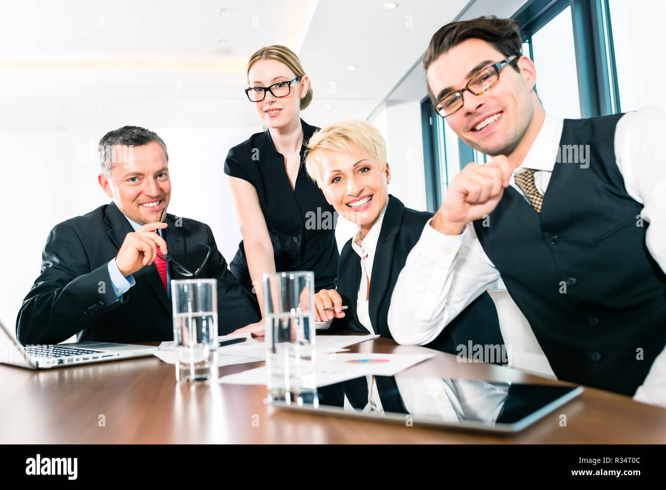 Happy successful business people Stock Photo - Alamy