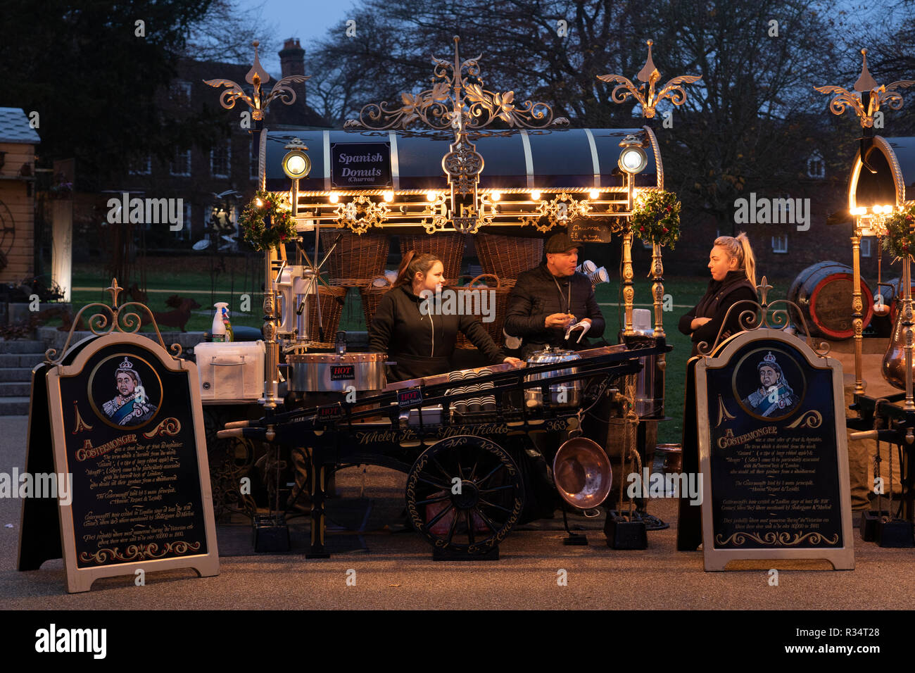 A costermonger market stall selling Spanish doughnuts (Churros) outside ...