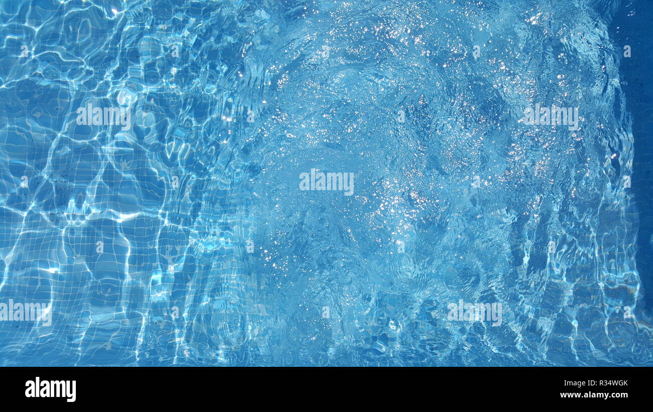 Pool water stirred in summer Stock Photo - Alamy