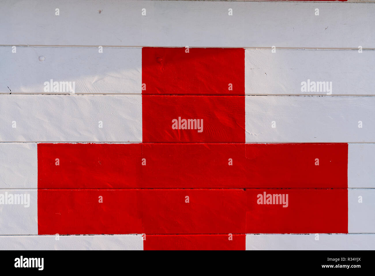 Detail of a painting of red lines on white wooden table Stock Photo - Alamy