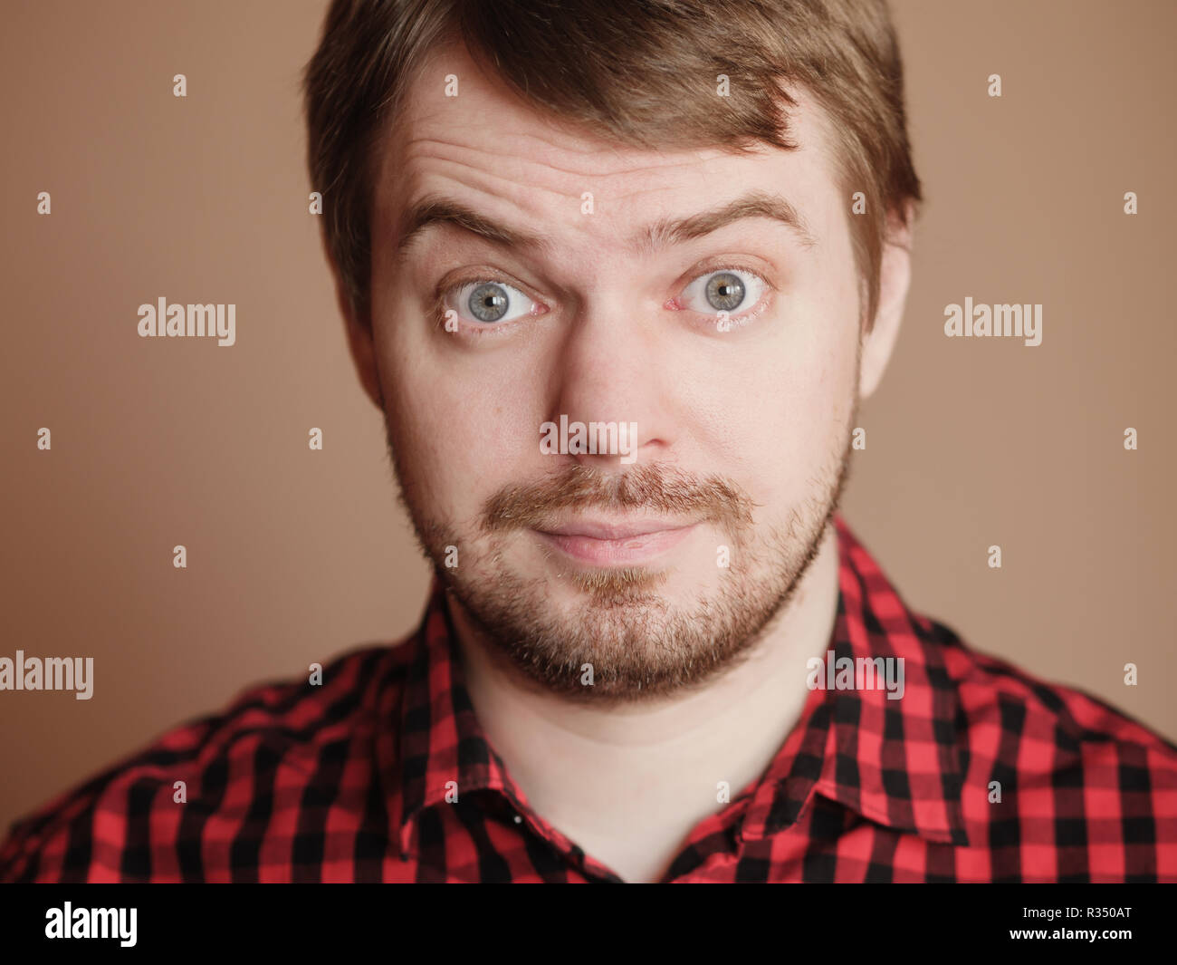 Man with surprised face Stock Photo - Alamy