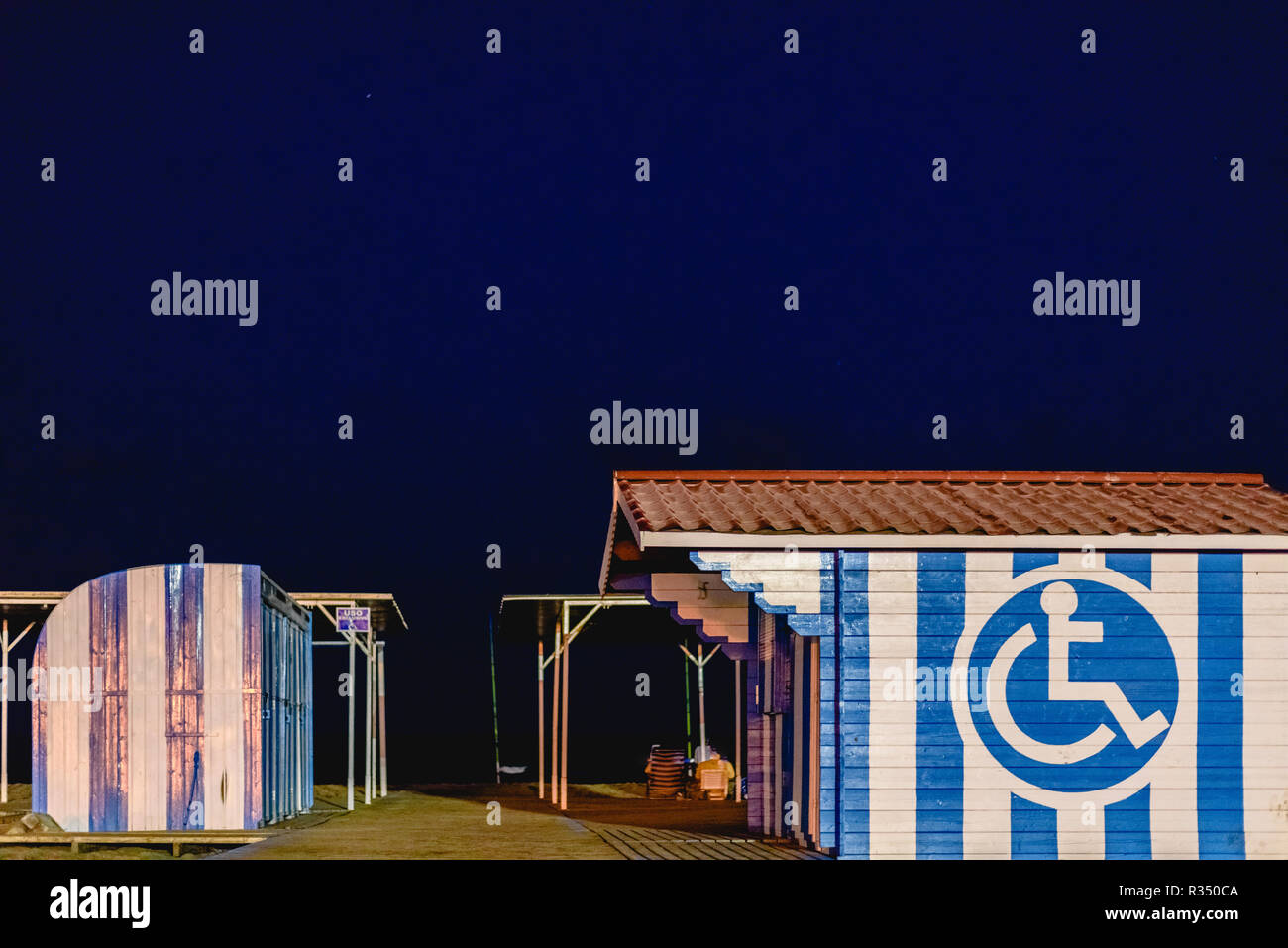 Box on the beach for disabled people with a symbol painted on it Stock ...