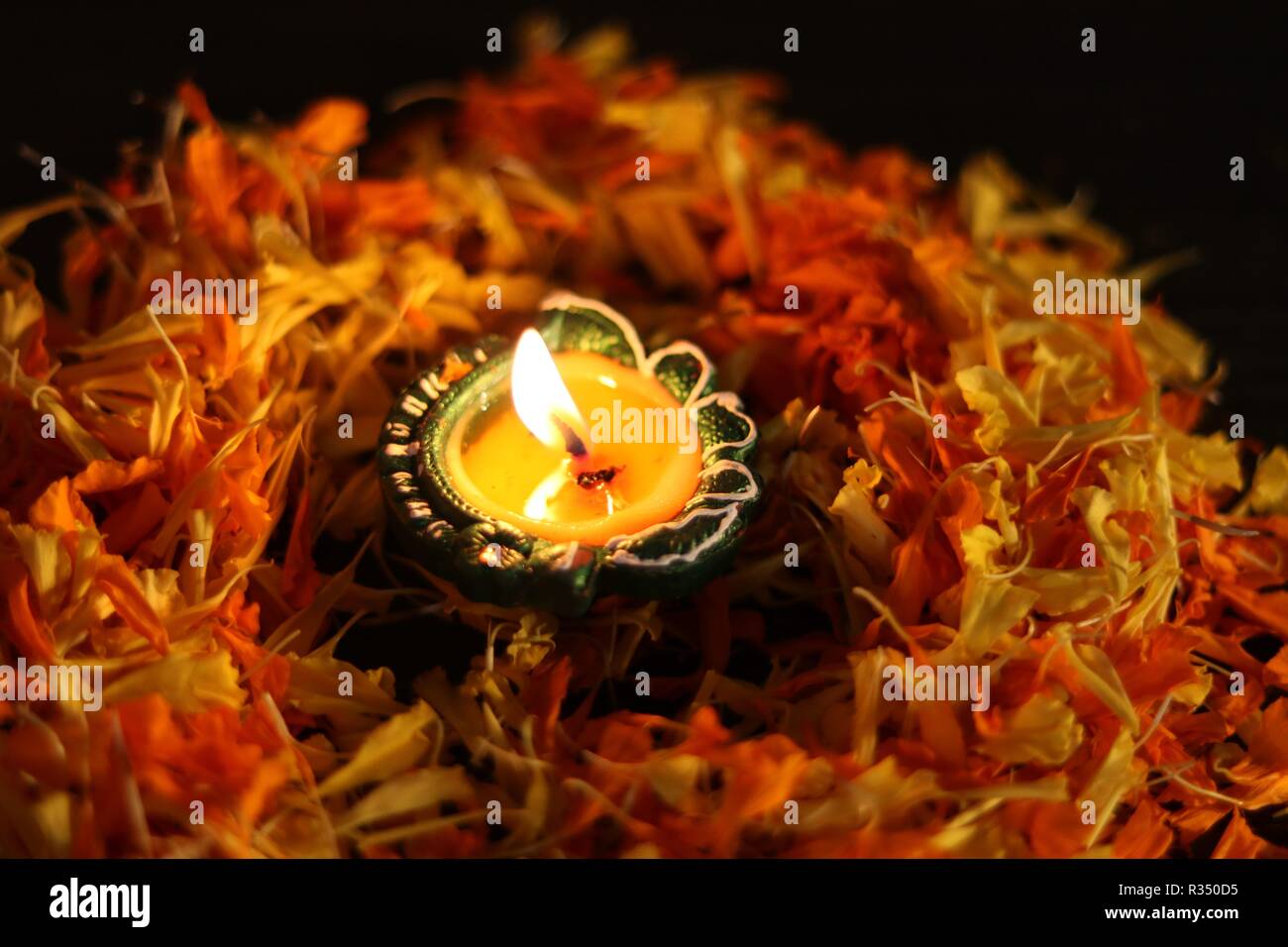 A typical view of lit diyas to celebrate diwali and dhanteras in Asia ...