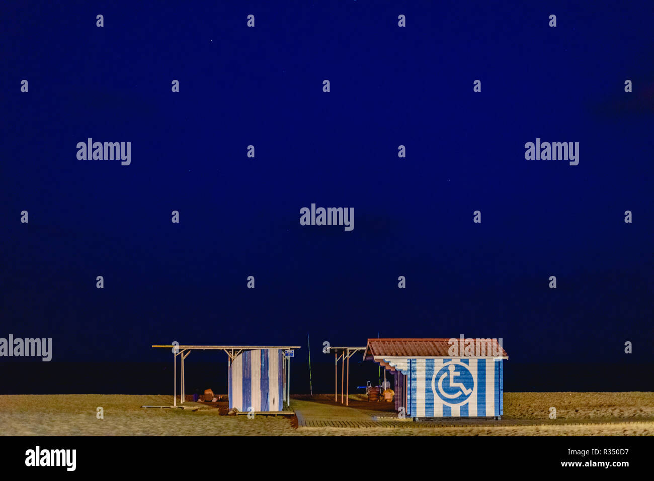 Box on the beach for disabled people with a symbol painted on it Stock ...