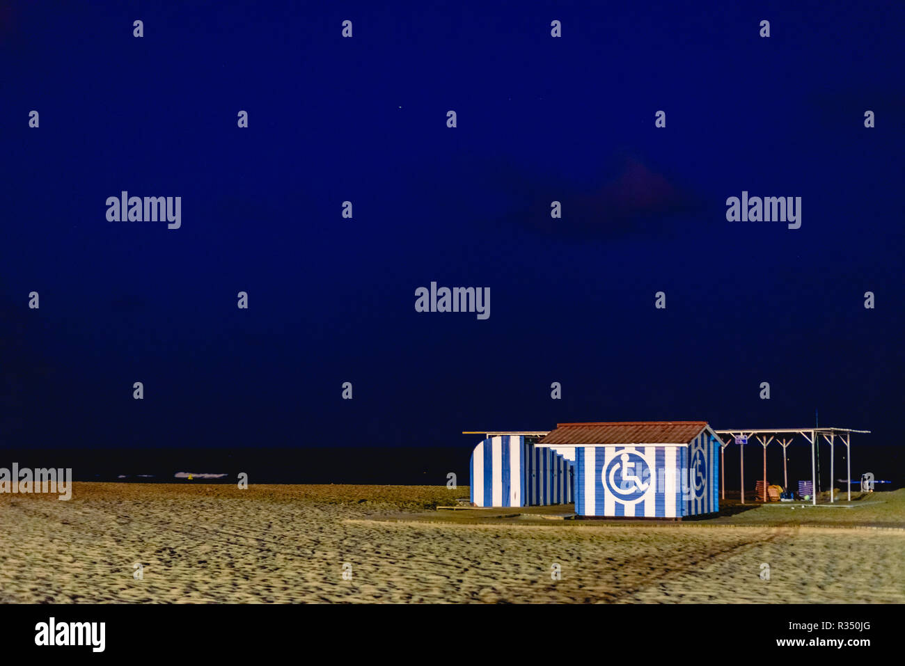 Box on the beach for disabled people with a symbol painted on it Stock ...