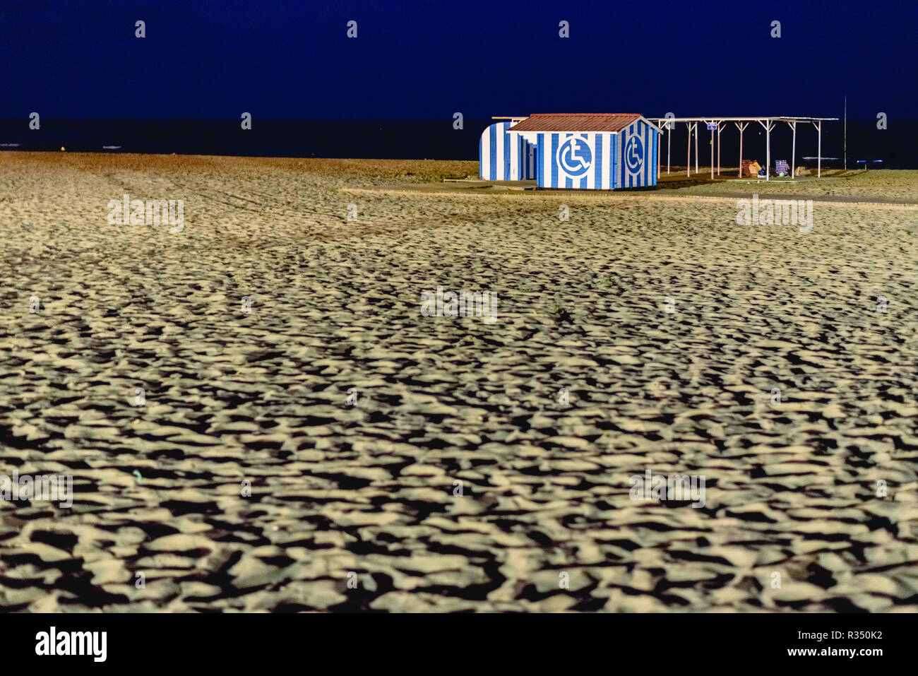 Box on the beach for disabled people with a symbol painted on it Stock ...