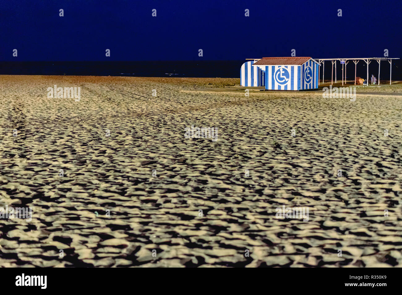 Box on the beach for disabled people with a symbol painted on it Stock ...