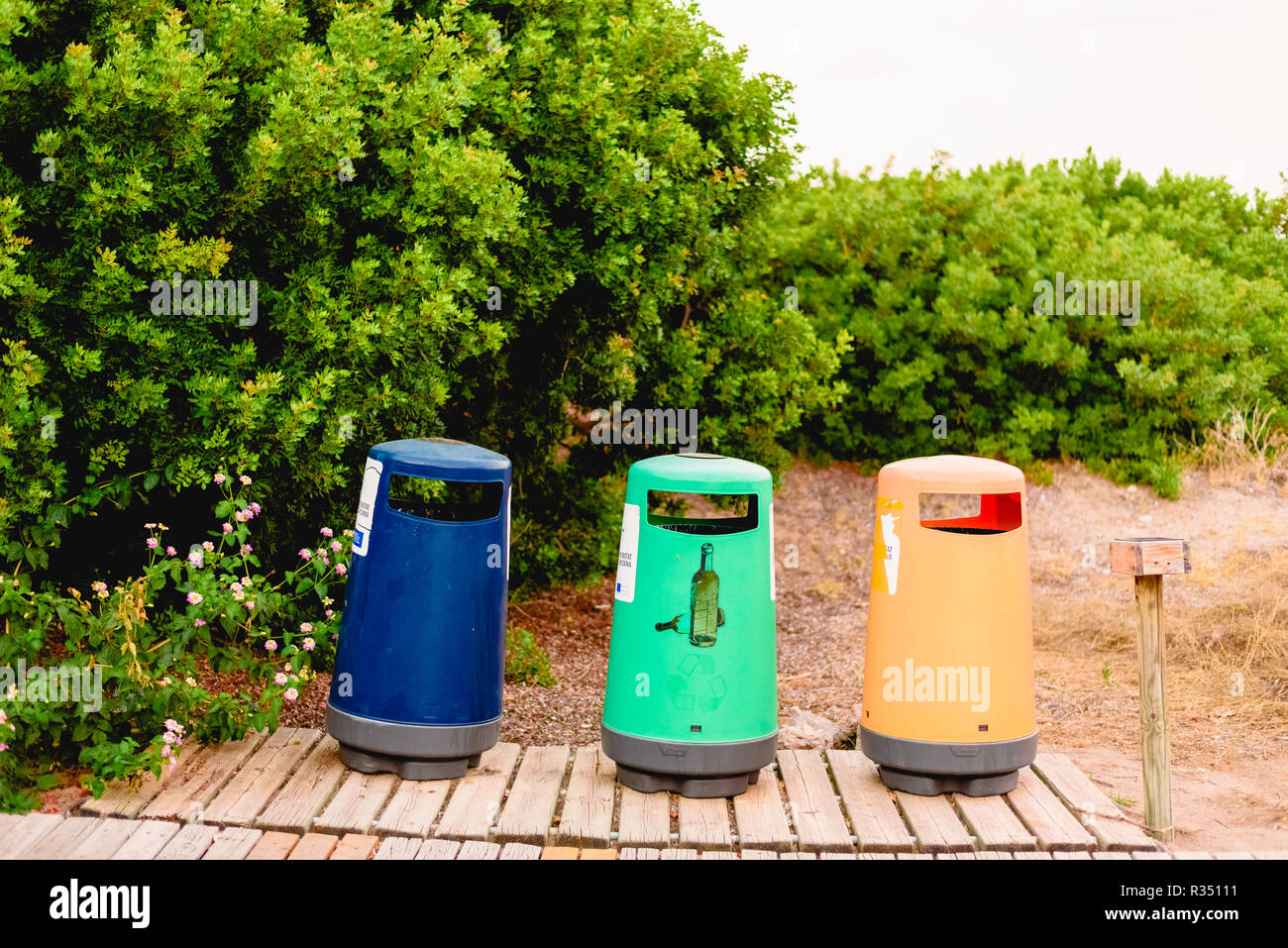 Recycling and organic bins in a forest Stock Photo - Alamy