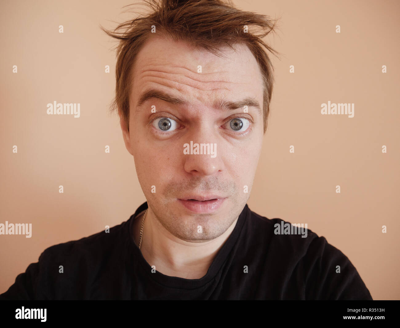 Portrait of a sleepy young man Stock Photo - Alamy
