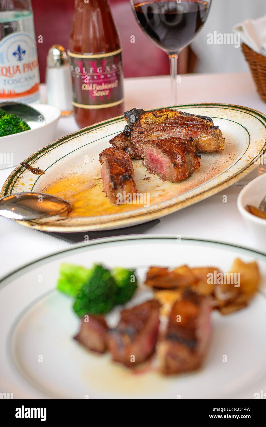 USDA Prime Petit Filet Mignon with sauteed onions and broccolli Stock ...