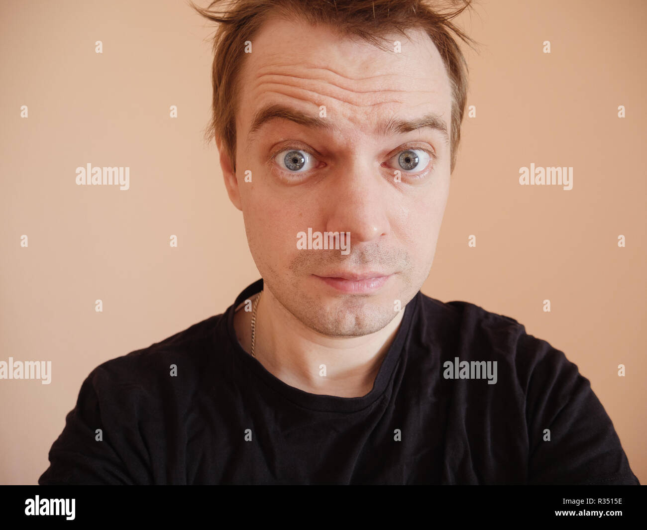 Portrait of a sleepy young man Stock Photo - Alamy