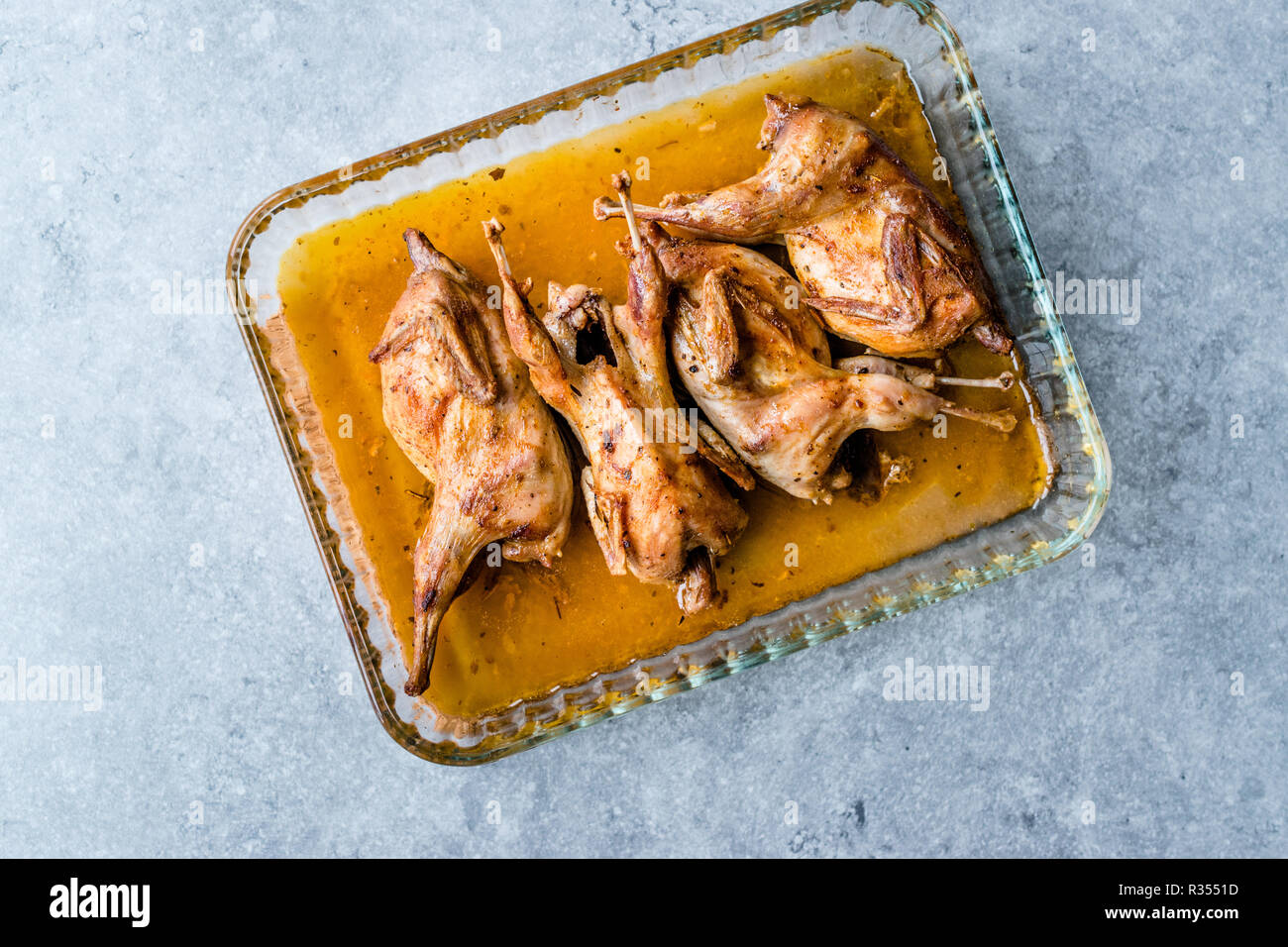 Roasted Crispy Quail Meat in Glass Bowl / Fried Small Chickens. Organic ...