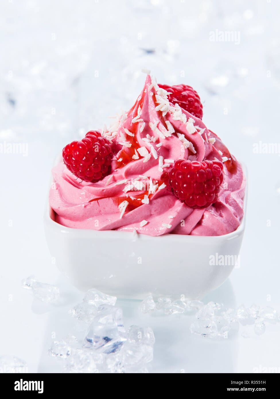 Coconut and raspberry frozen yoghurt hi-res stock photography and ...