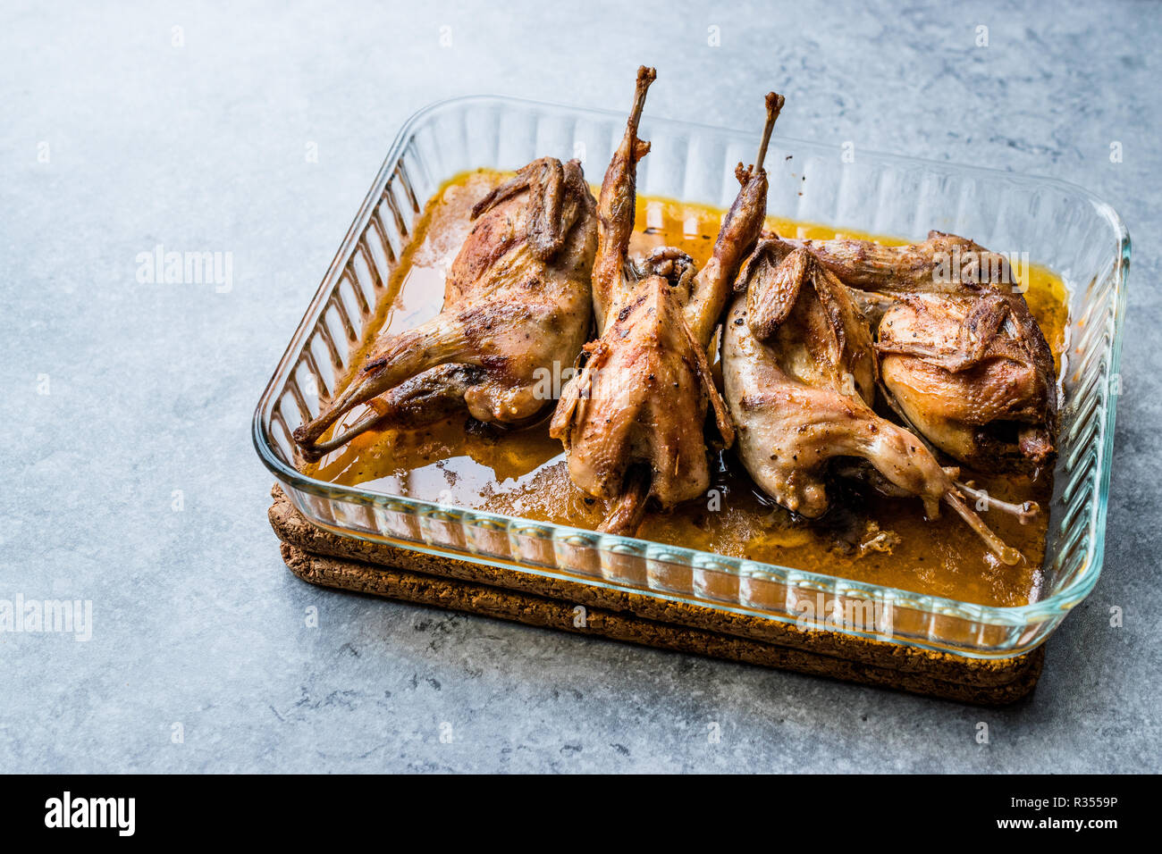 Roasted Crispy Quail Meat in Glass Bowl / Fried Small Chickens. Organic ...