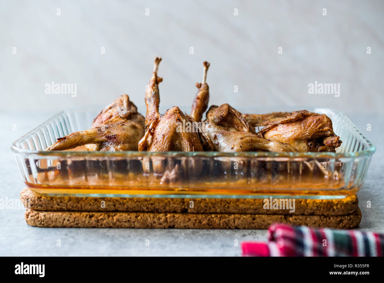 Roasted Crispy Quail Meat in Glass Bowl / Fried Small Chickens. Organic ...