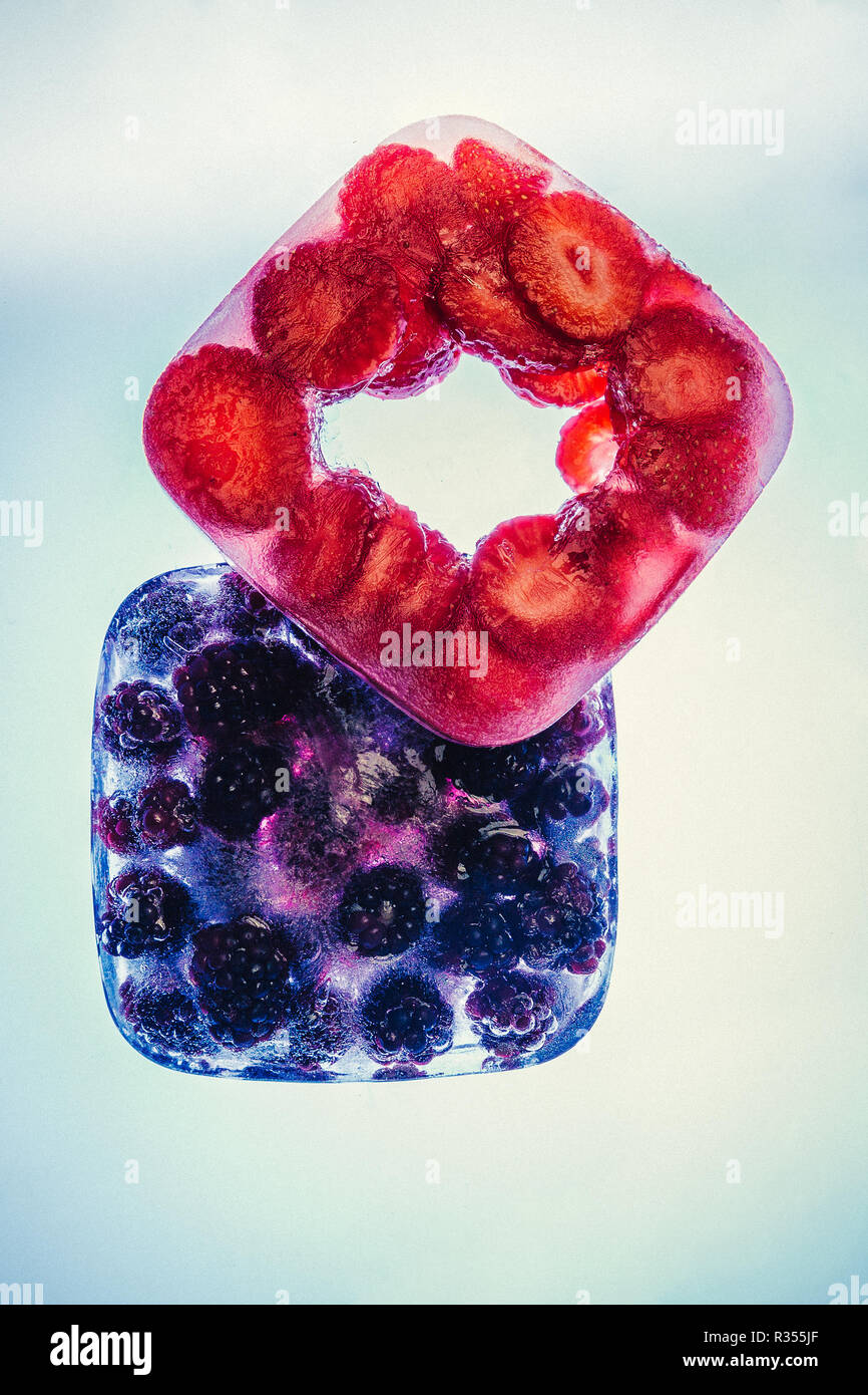 Frozen black berry and strawberry slices fruit block cubes Stock Photo ...