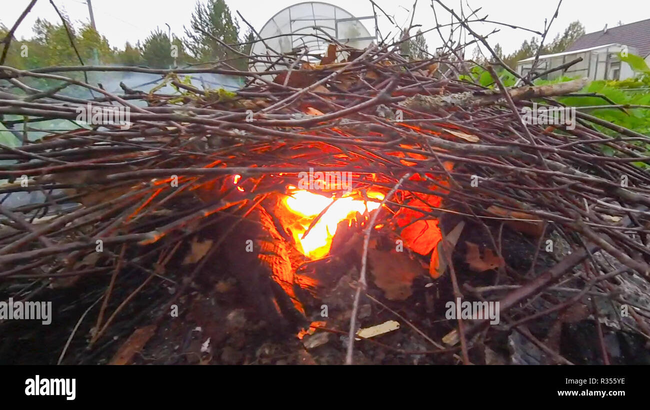 The fire is ignited in a fire of twigs and branches Stock Photo - Alamy