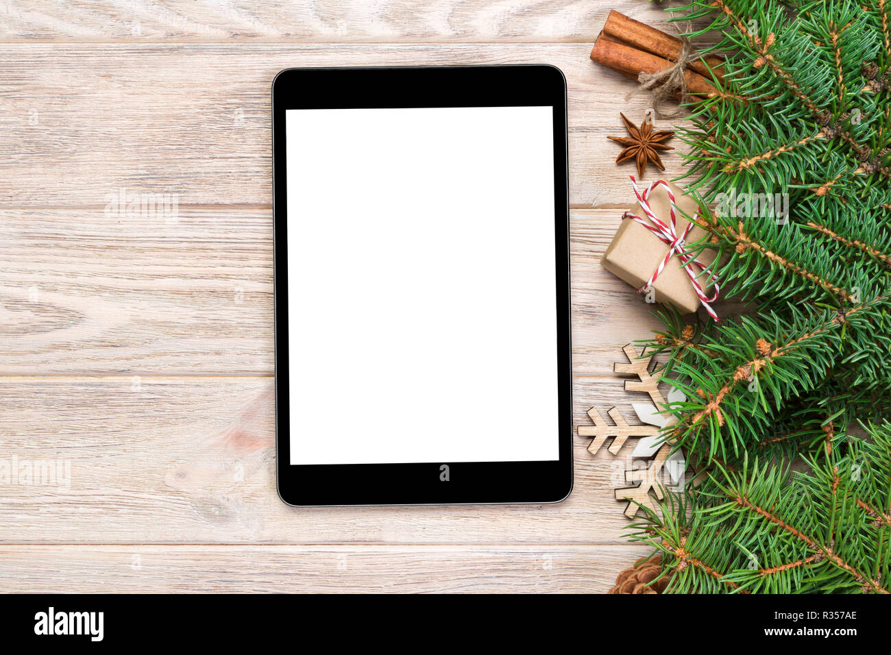 Digital tablet mock up with rustic Christmas wood background ...
