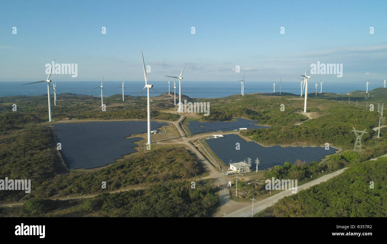 Aerial view of Windmills for electric power production on the seashore ...