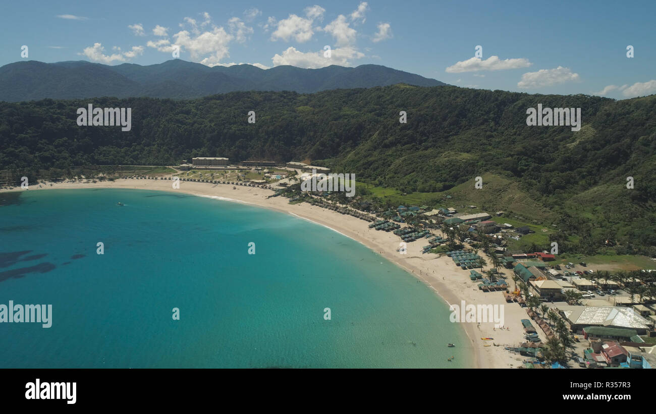 Aerial view of beautiful tropical beach with turquoise water in blue ...