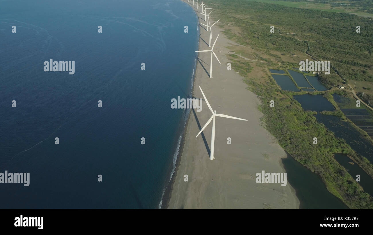 Aerial view of Windmills for electric power production on the coast ...