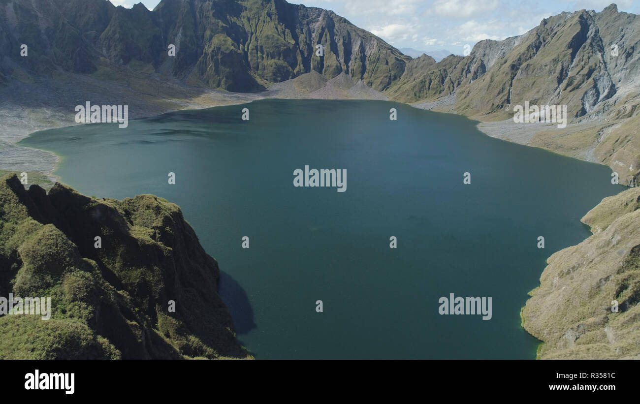 Crater lake of the volcano Pinatubo among the mountains, Philippines ...