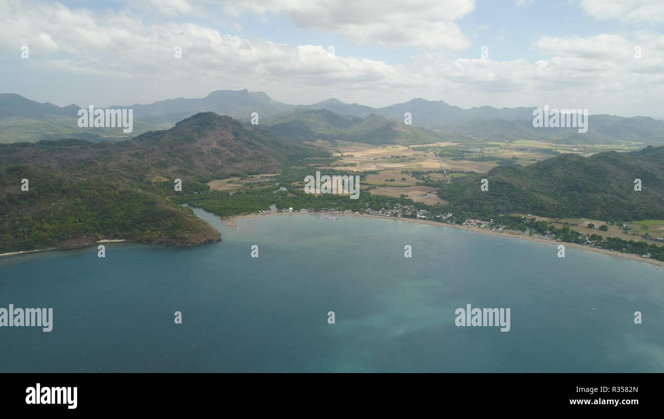 Aerial view of seashore with beach, lagoons and coral reefs ...