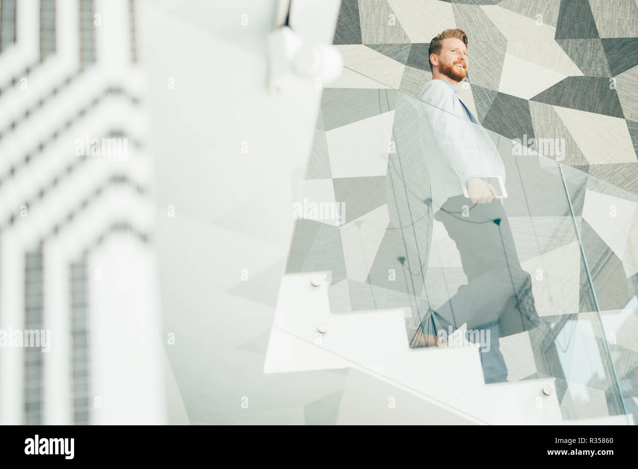 Dynamic handsome businessman Stock Photo - Alamy