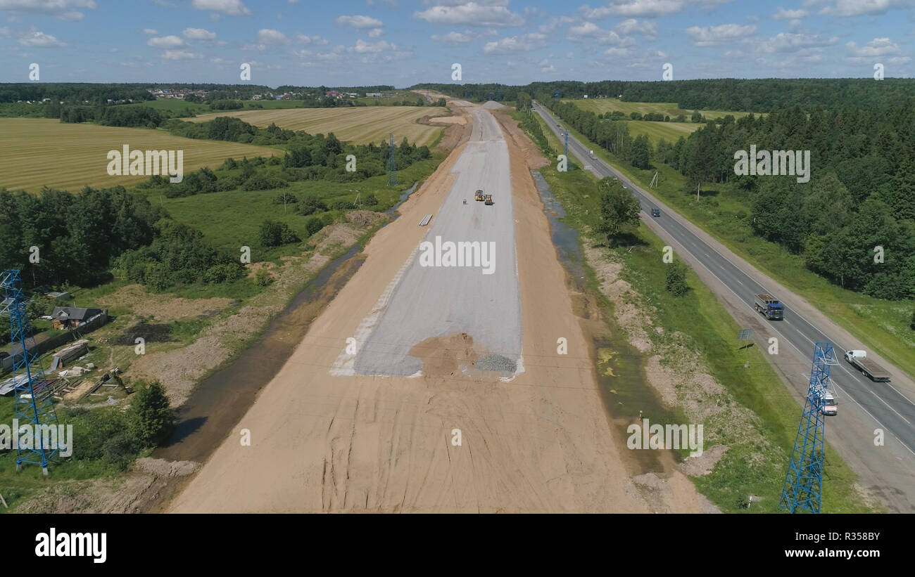 Construction of toll roads in rural areas. Aerial view construction of ...