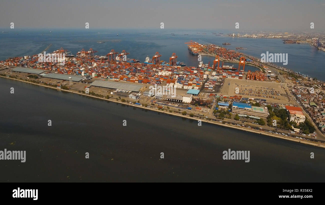 Aerial view industrial cargo port with ships and cranes, Manila. View ...