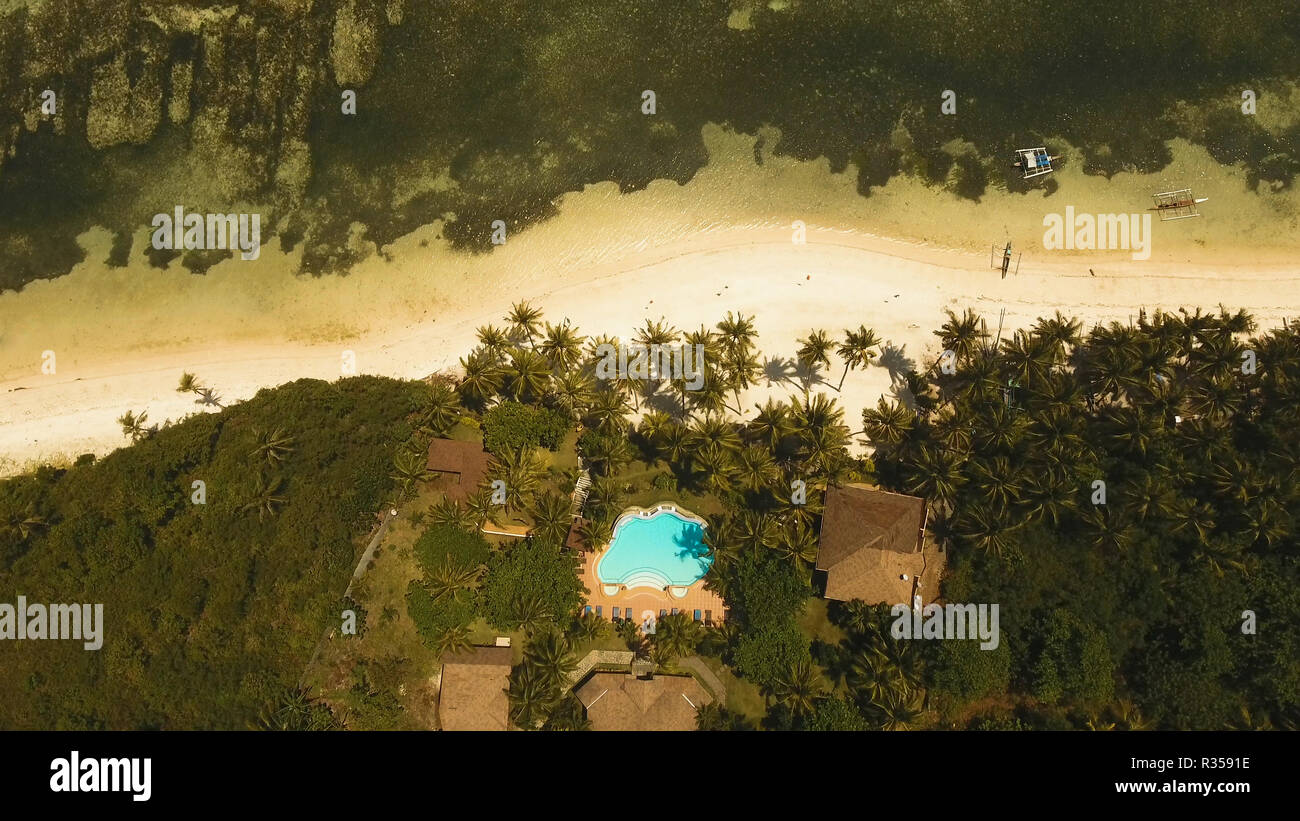Aerial view of tropical beach with beach,resort, hotels on the island ...