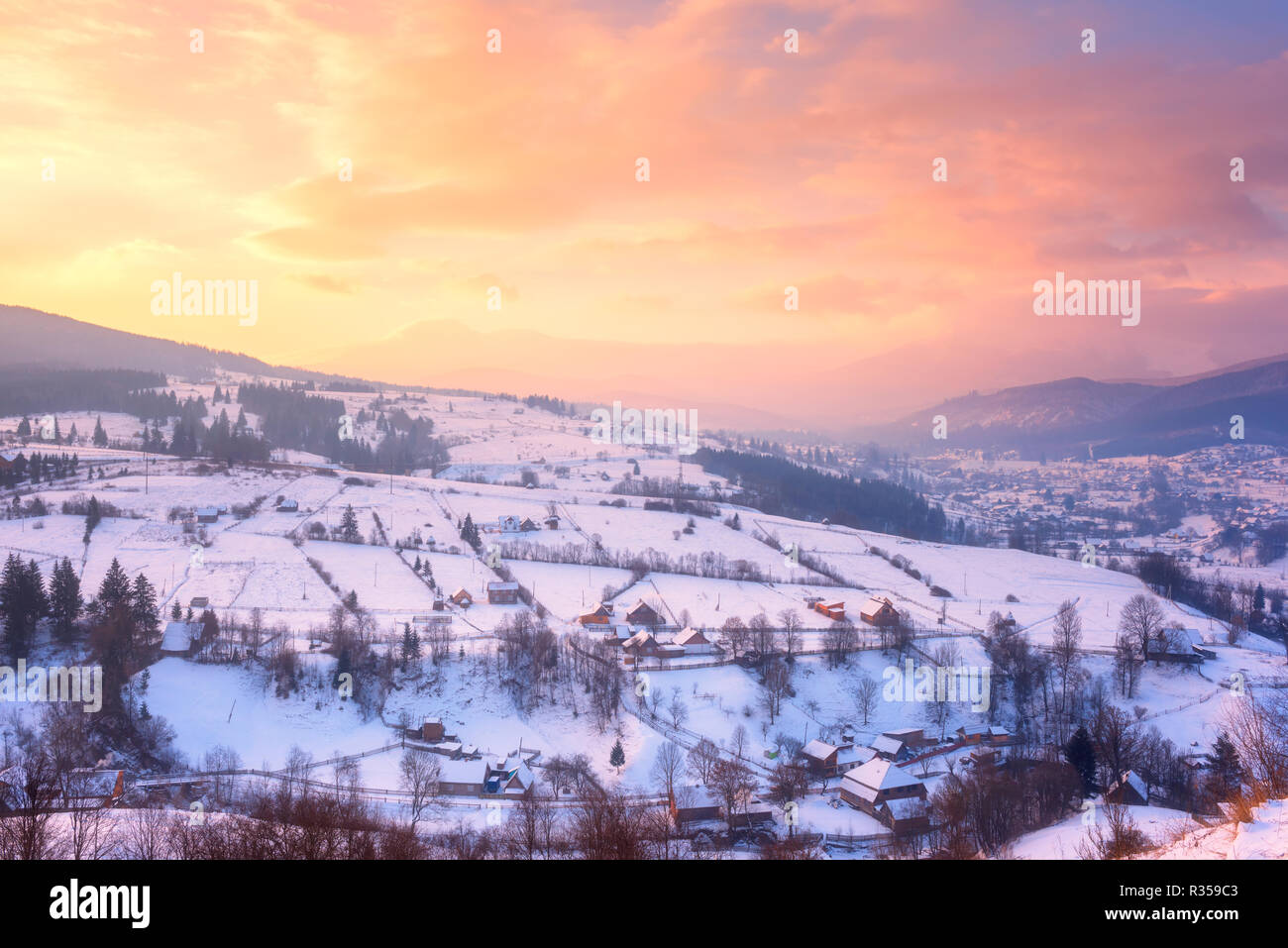 Beautiful winter landscape in soft sunset light, alpine valley ...