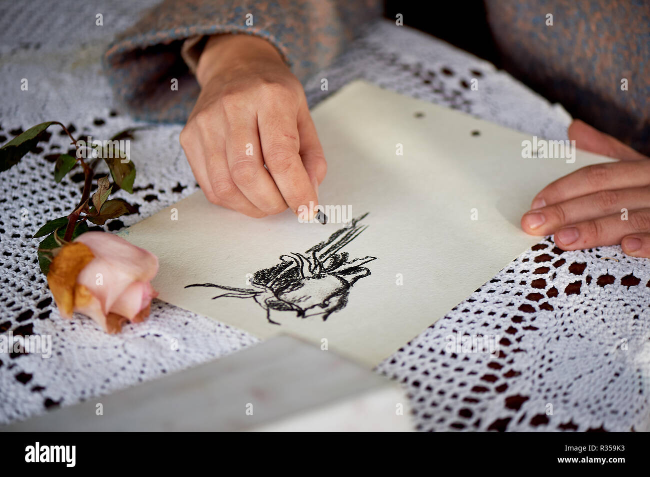 The artist draws have.The creative process of painting Stock Photo - Alamy
