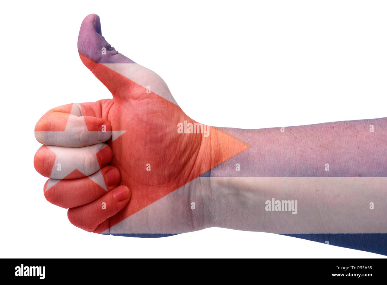 The concept of Cuba-the hand gives a thumbs up with the flag of Cuba ...